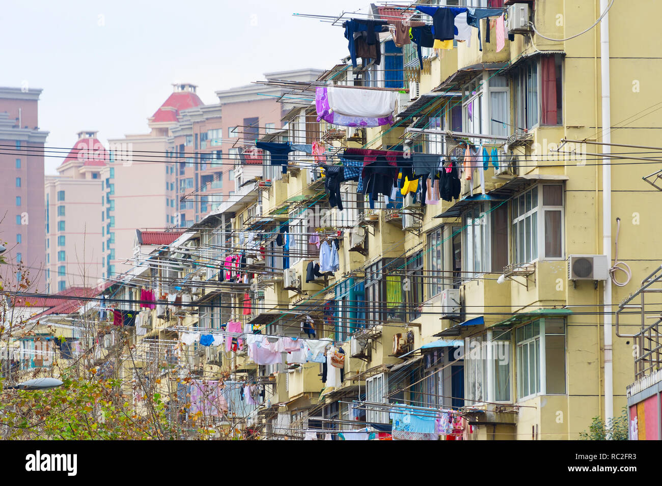 Shanghai living district. Clothes drying in typical Shanghai way. China ...