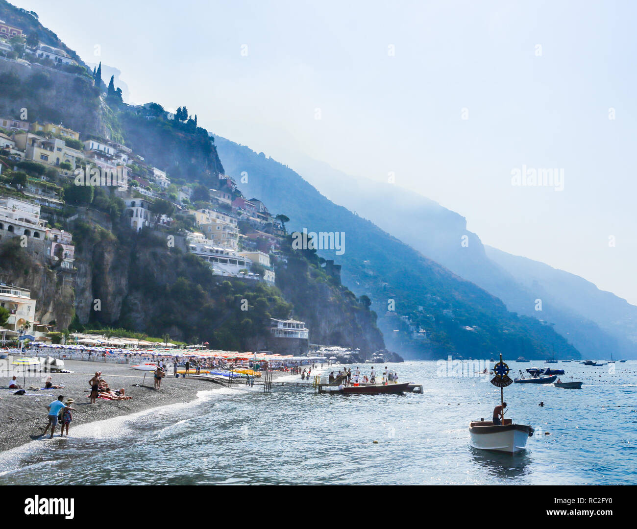 Tourist ships in visitfamous and picturesque port in Positano. Italy ...