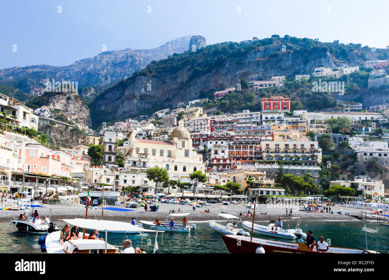 Tourist ships in visitfamous and picturesque port in Positano. Italy ...