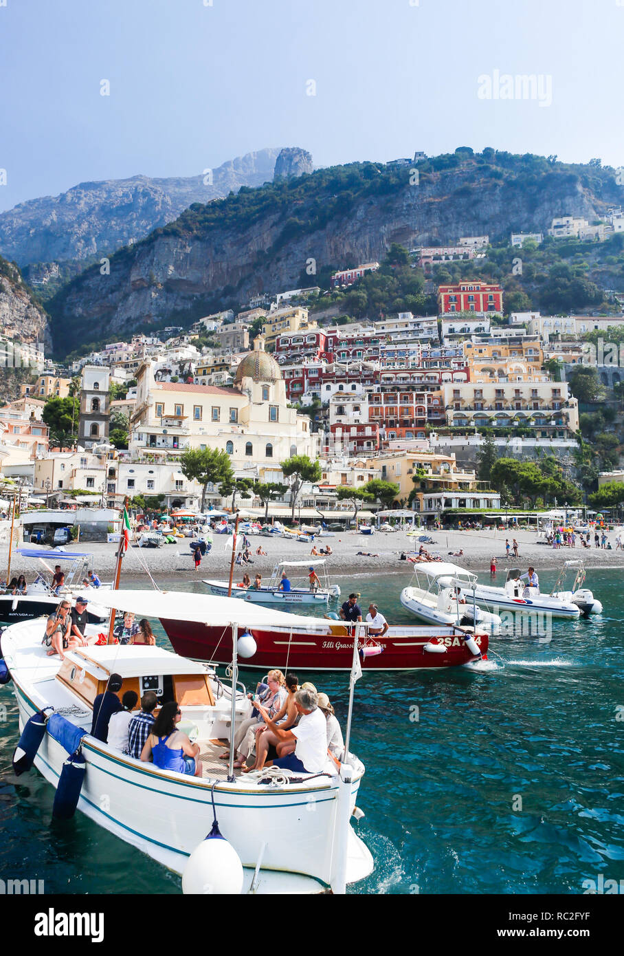 Tourist ships in visitfamous and picturesque port in Positano. Italy ...