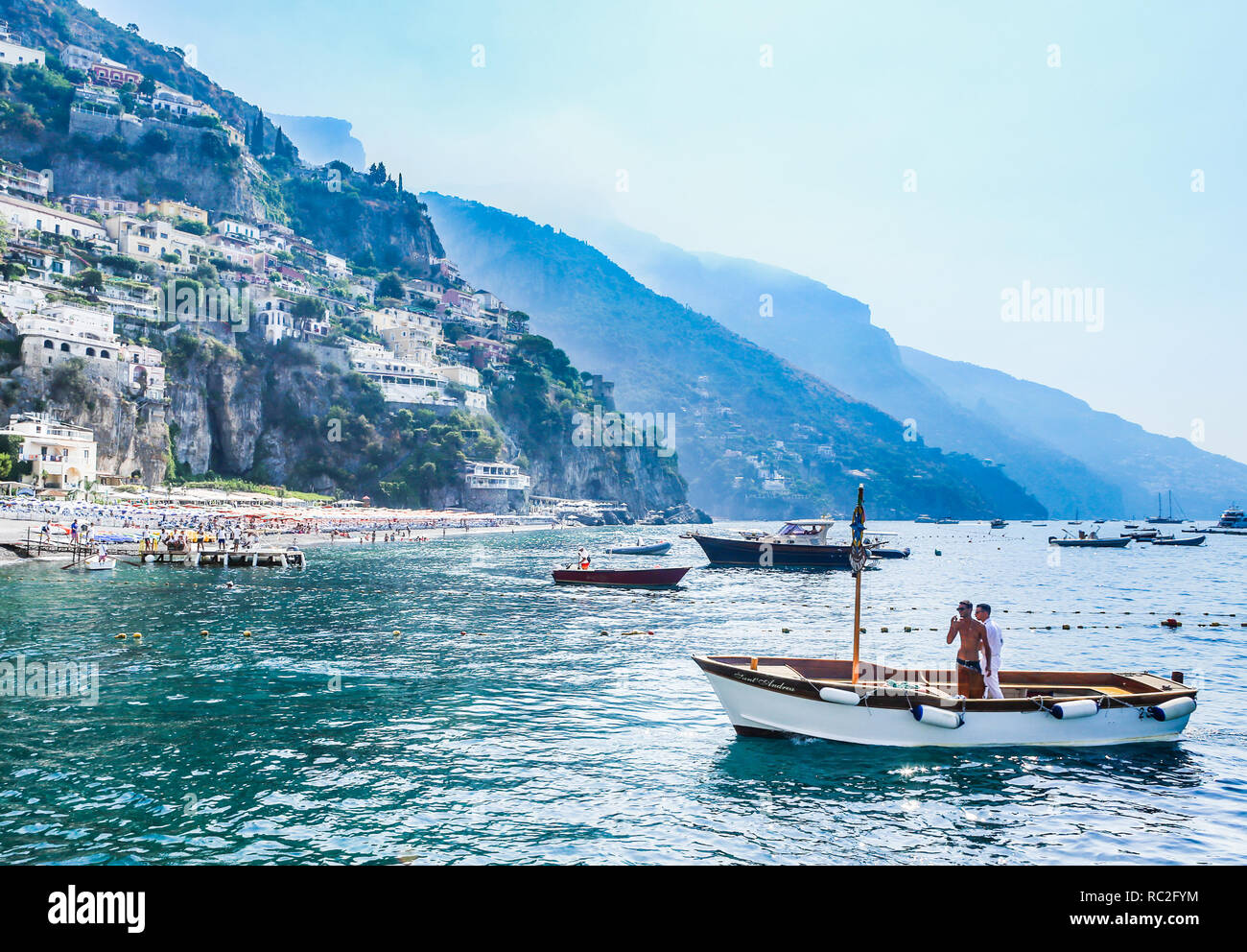 Tourist ships in visitfamous and picturesque port in Positano. Italy ...