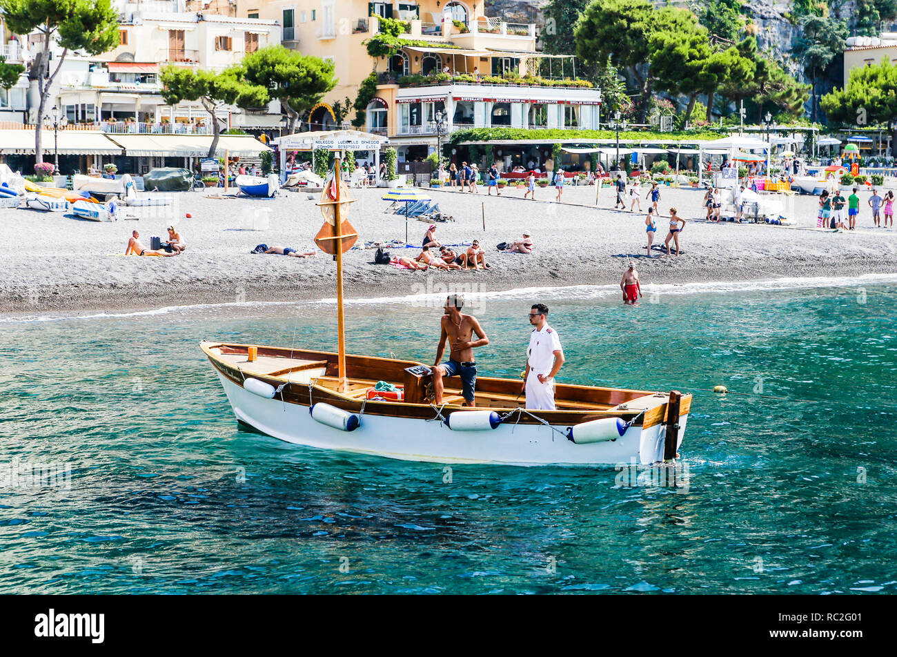 Tourist ship in visitfamous and picturesque port in Positano. Italy ...