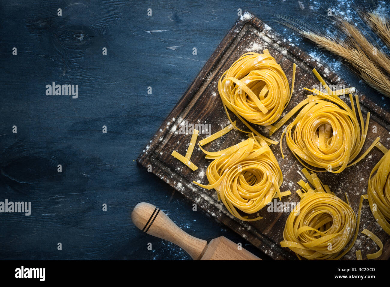 Italian raw homemade pasta tagliatelle Stock Photo - Alamy
