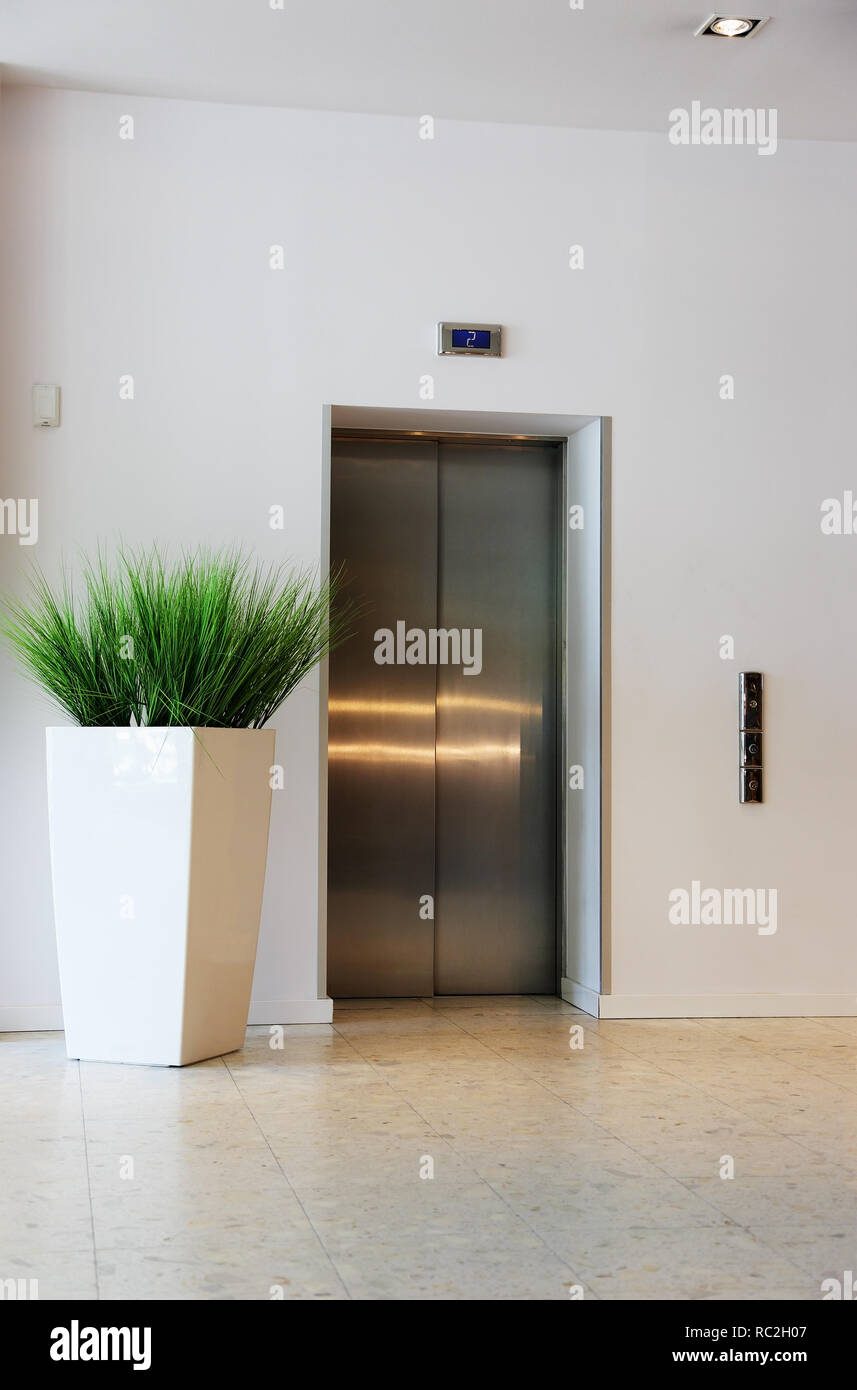 lift with metal door for hotel guests Stock Photo - Alamy