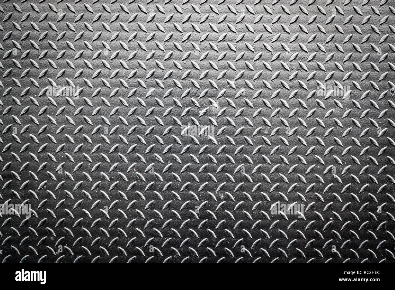 Dark metal floor plate pattern texture background Stock Photo - Alamy