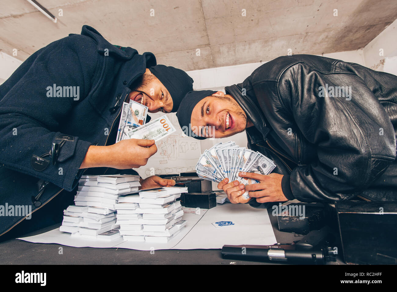 Gangsters are having a revolver on the table and counting money Stock ...