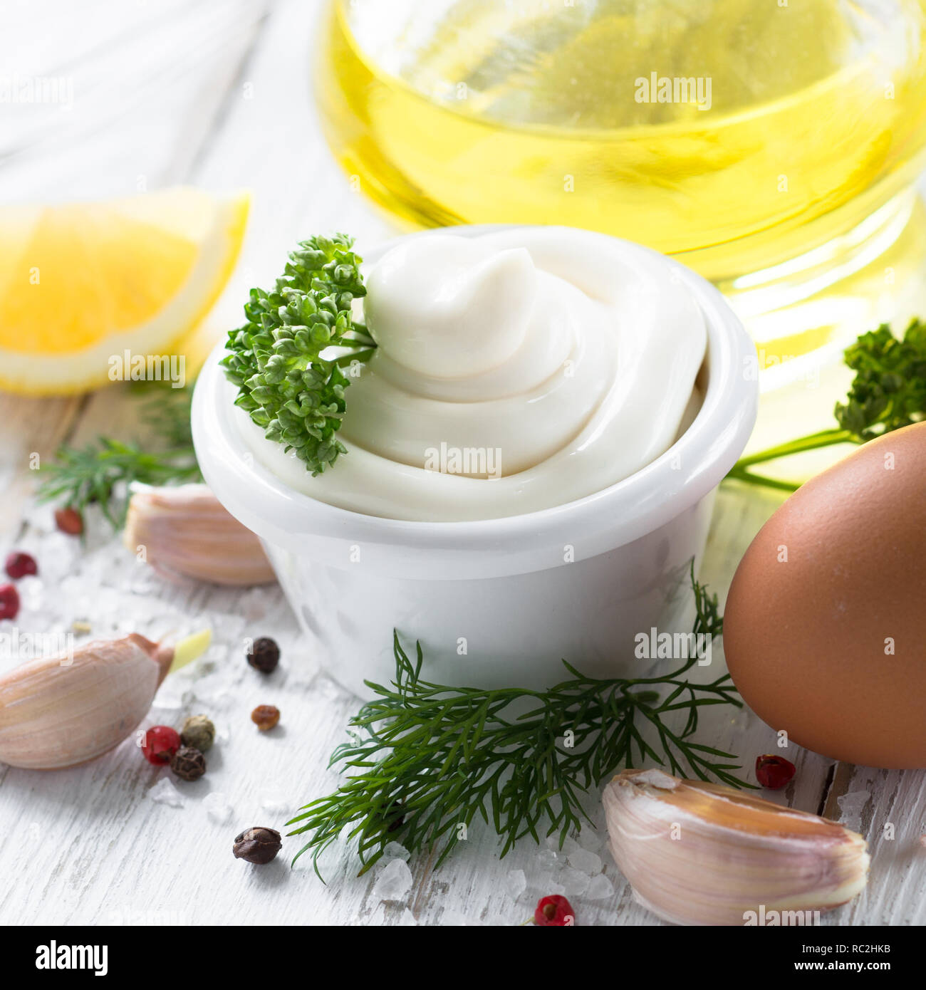 Mayonnaise sauce and ingredients on white Stock Photo - Alamy