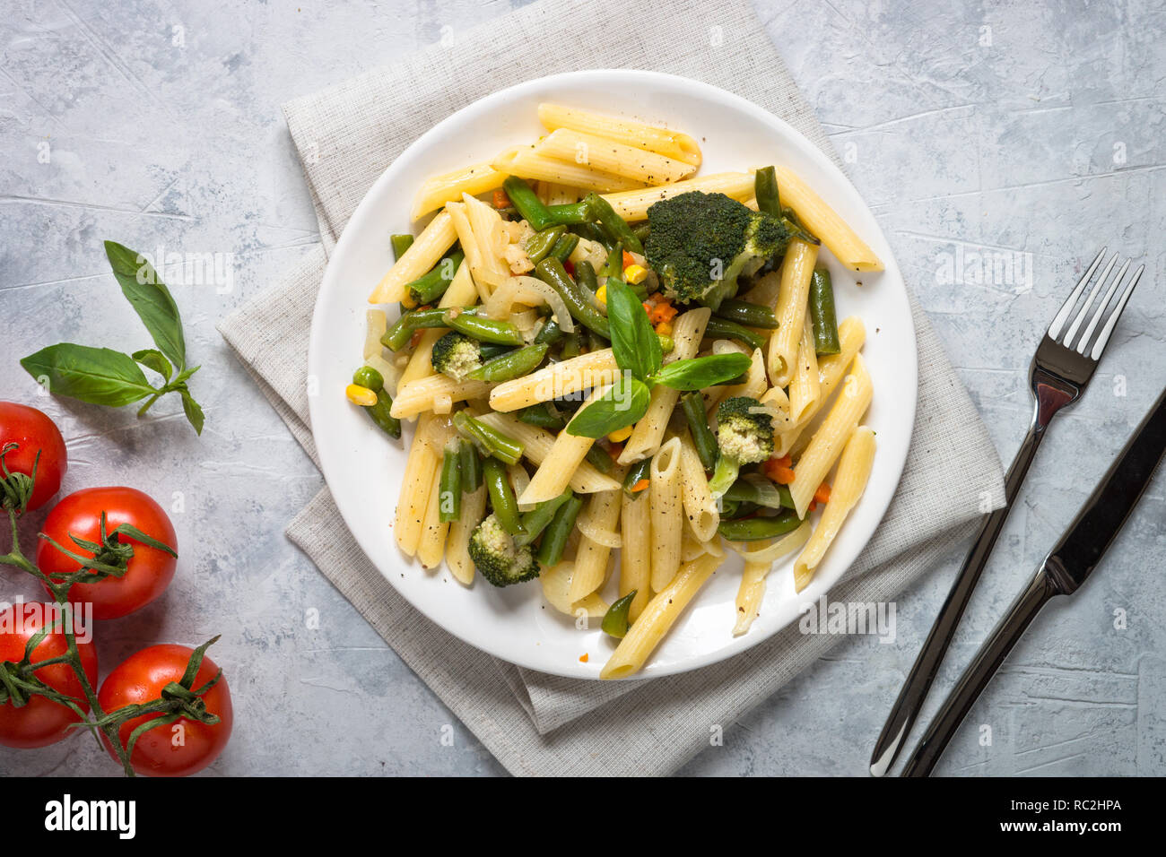Italian vegetarian pasta penne with green vegetables Stock Photo - Alamy