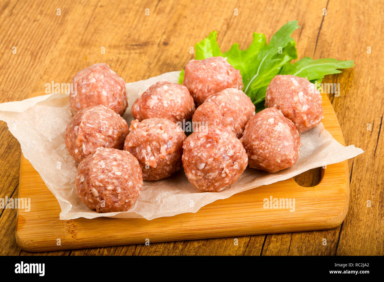 Raw meat balls for cooking Stock Photo - Alamy