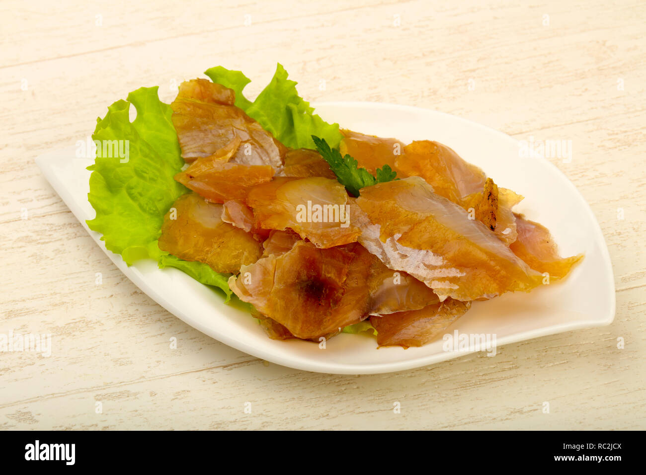 Smoked catfish fillet carpaccio Stock Photo - Alamy