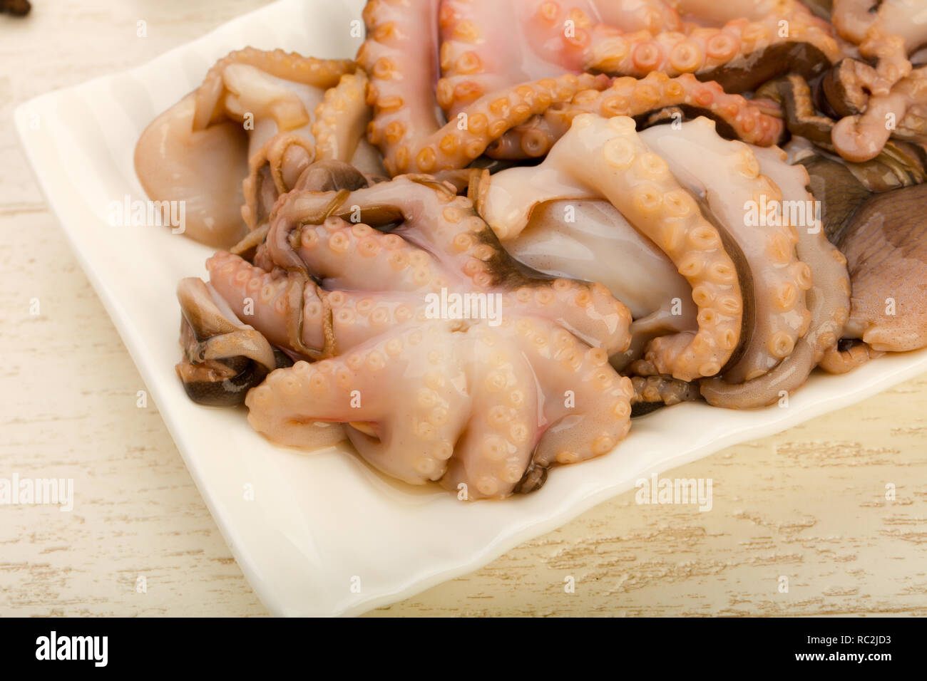 Raw octopus ready for cooking Stock Photo - Alamy