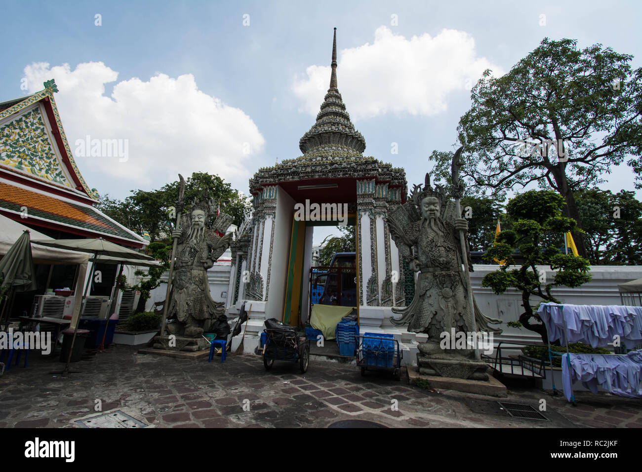 Grand Palace Bangkok Thailand spires spire round building outside trees ...