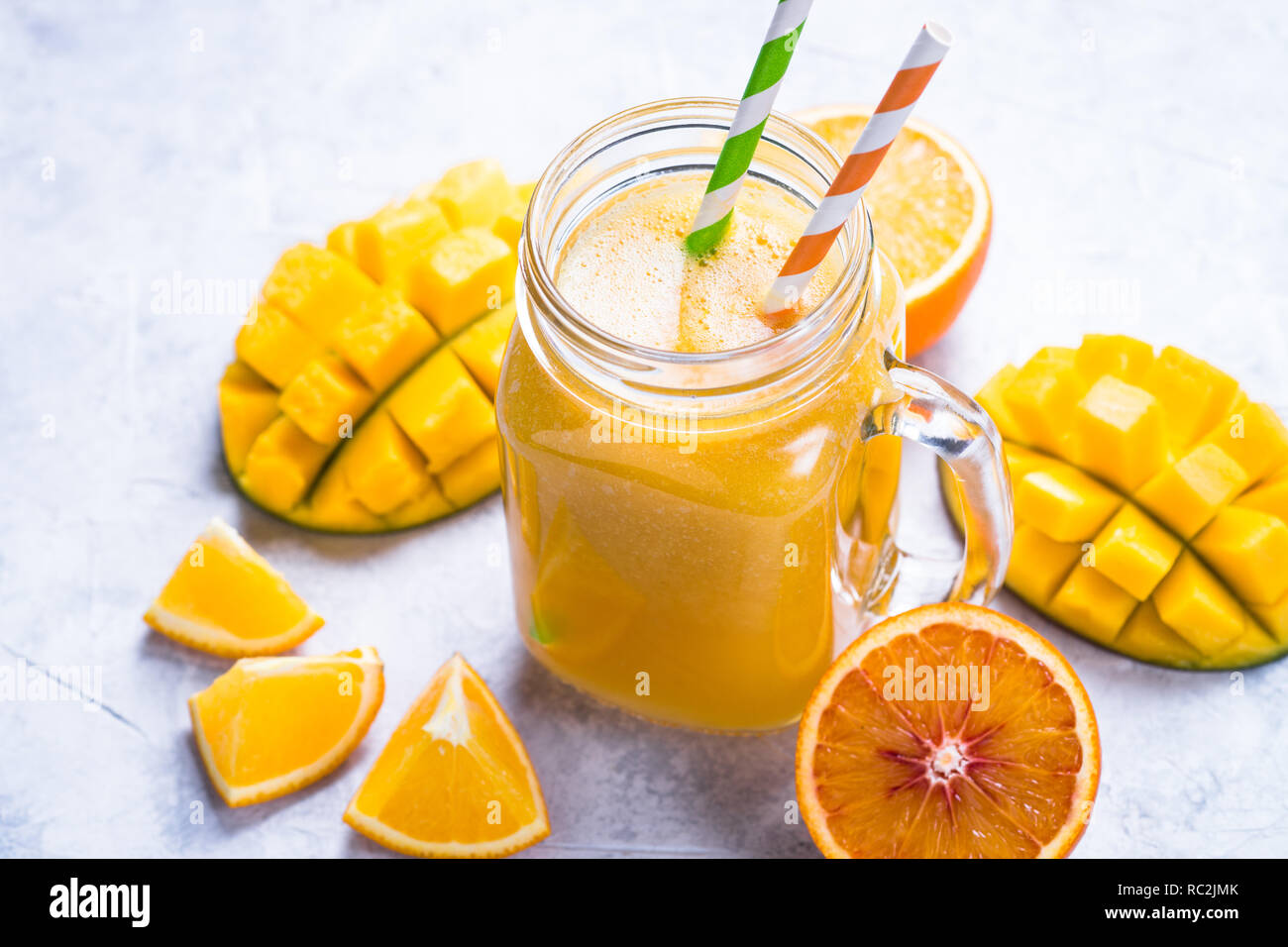 Mango orange juice smoothie Stock Photo - Alamy