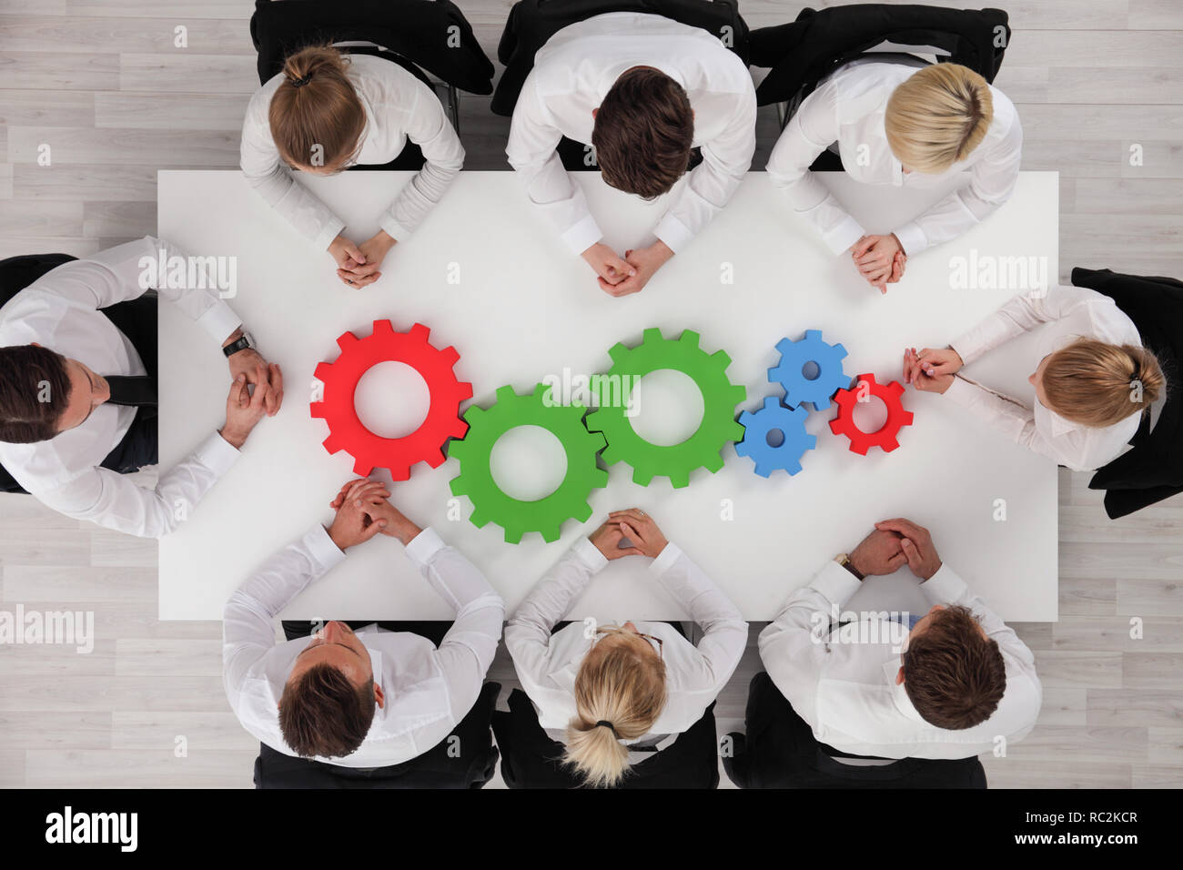 Teamwork collaboration unity corporate gear hi-res stock photography ...