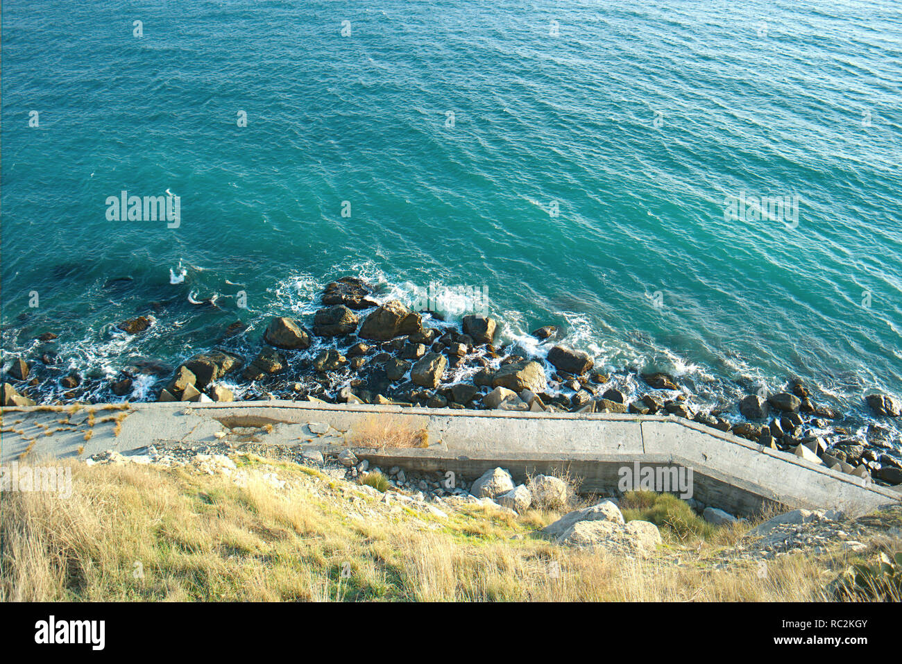 Concrete breakwater on a sea coast, above view Stock Photo - Alamy