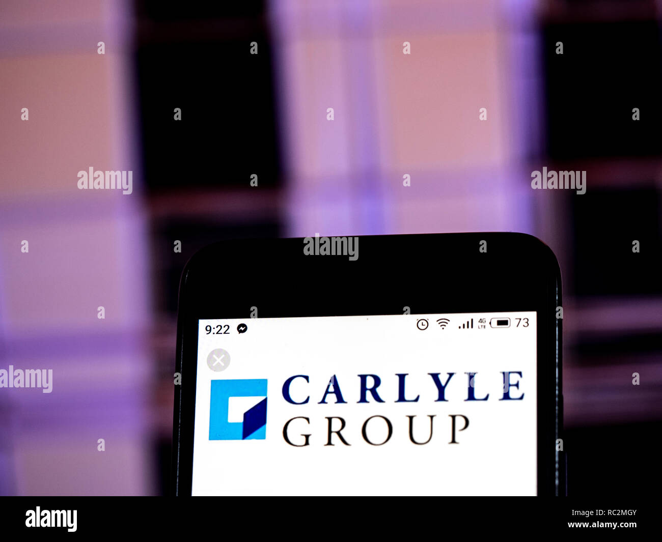 The Carlyle Group Private equity company logo seen displayed on smart ...