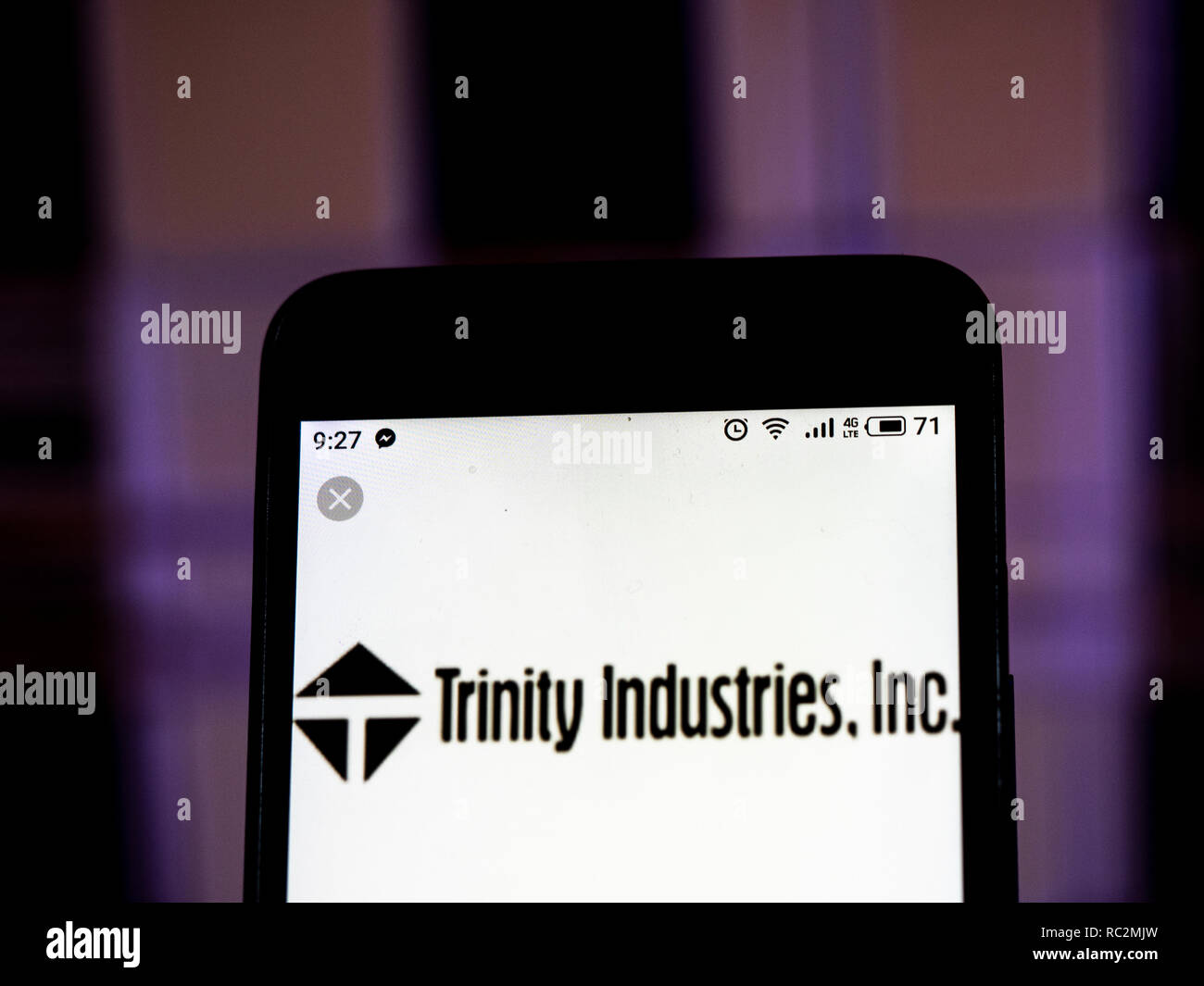Trinity Industries Corporate group company logo seen displayed on smart ...