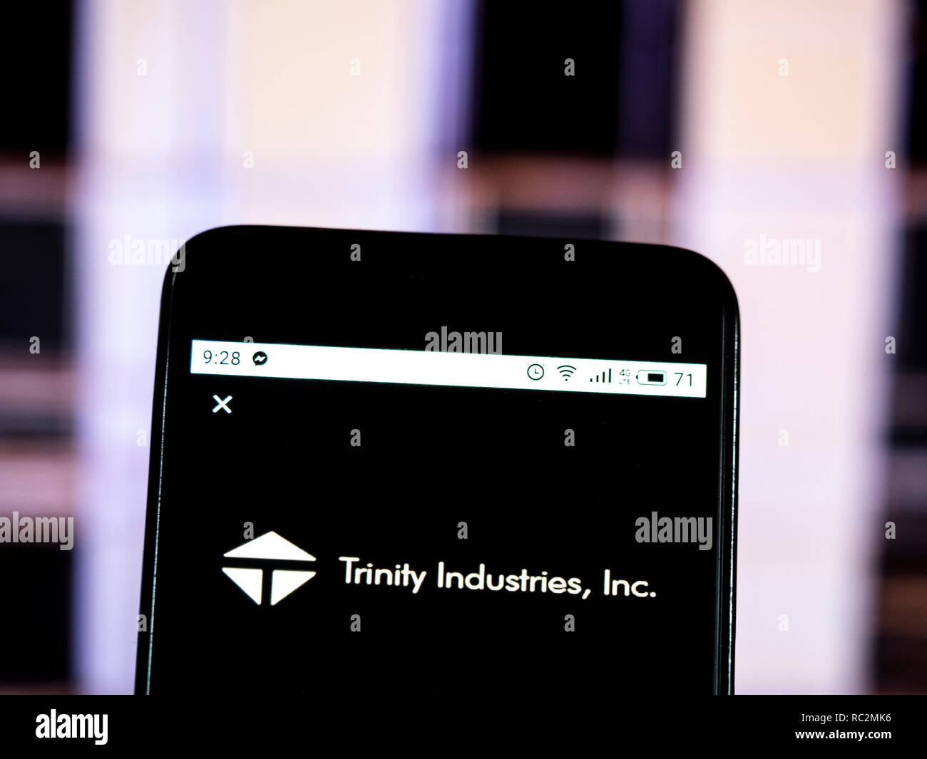 Trinity Industries Corporate group company logo seen displayed on smart ...