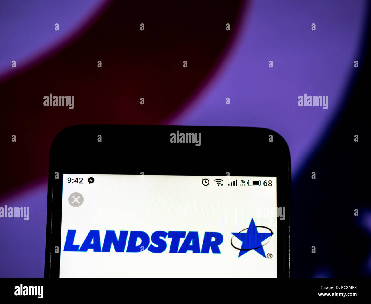 Landstar System Transport company logo seen displayed on smart phone ...