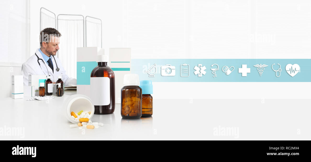 doctor at desk office with pills, drugs and medicine bottles, internet ...