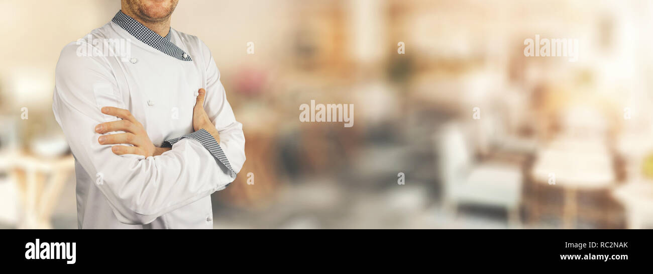 chef standing in restaurant with crossed arms. banner copy space Stock ...