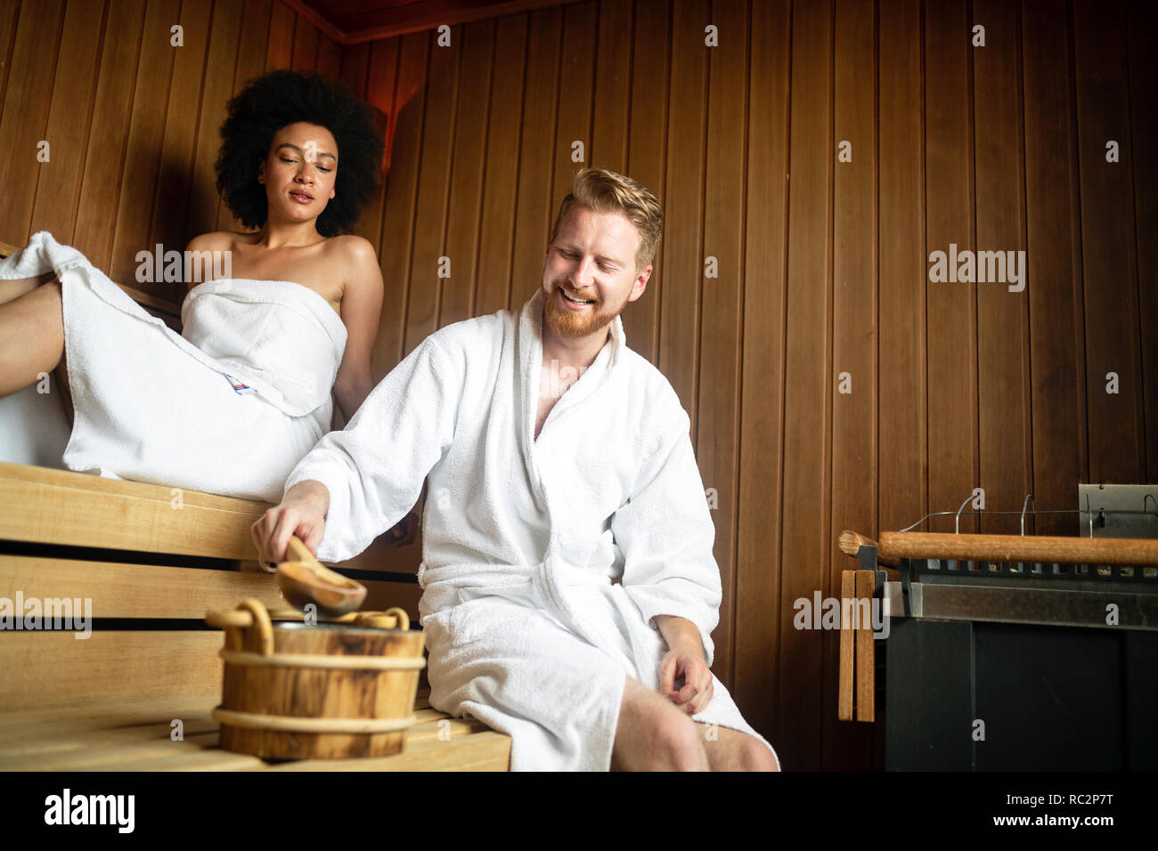 Young happy couple relaxing at spa resort hotel luxury. Relax, love ...