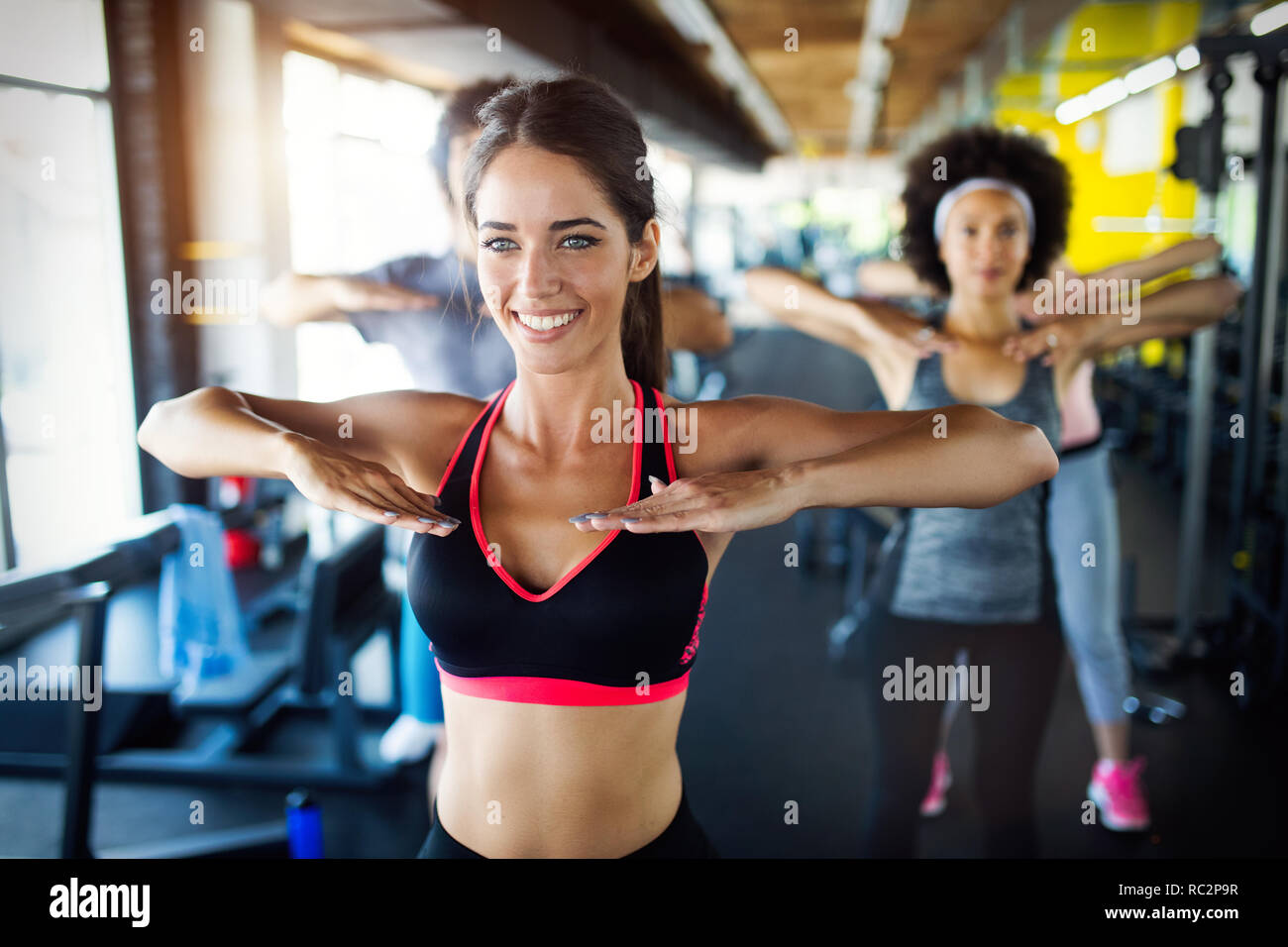 Beautiful women working out in gym together Stock Photo - Alamy