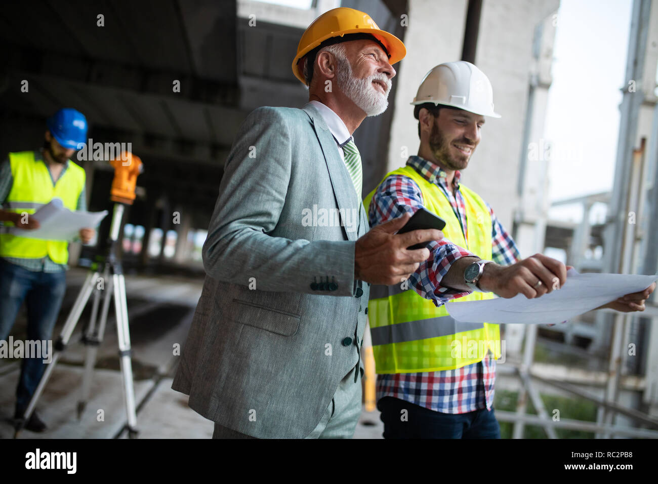 Group of construction engineer working in construction site Stock Photo ...