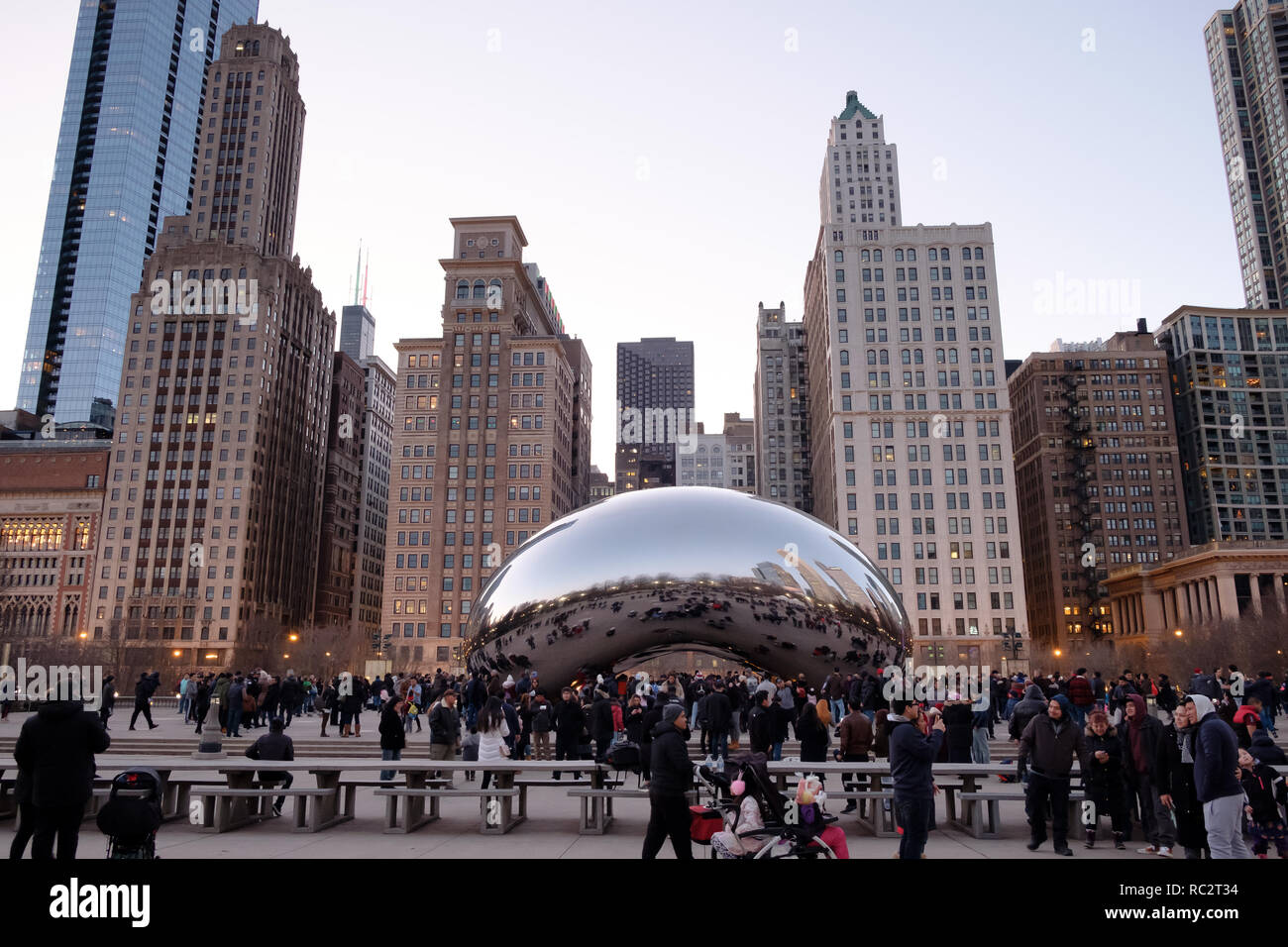 Cloud Gate and Chicago skyline in Millennium Park, Chicago, Illinois ...