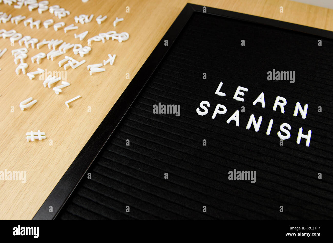 Learn languages sign on black background Stock Photo - Alamy