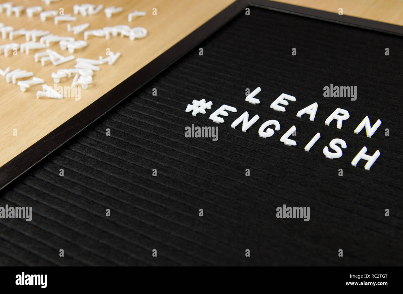 Learn languages sign on black background Stock Photo - Alamy