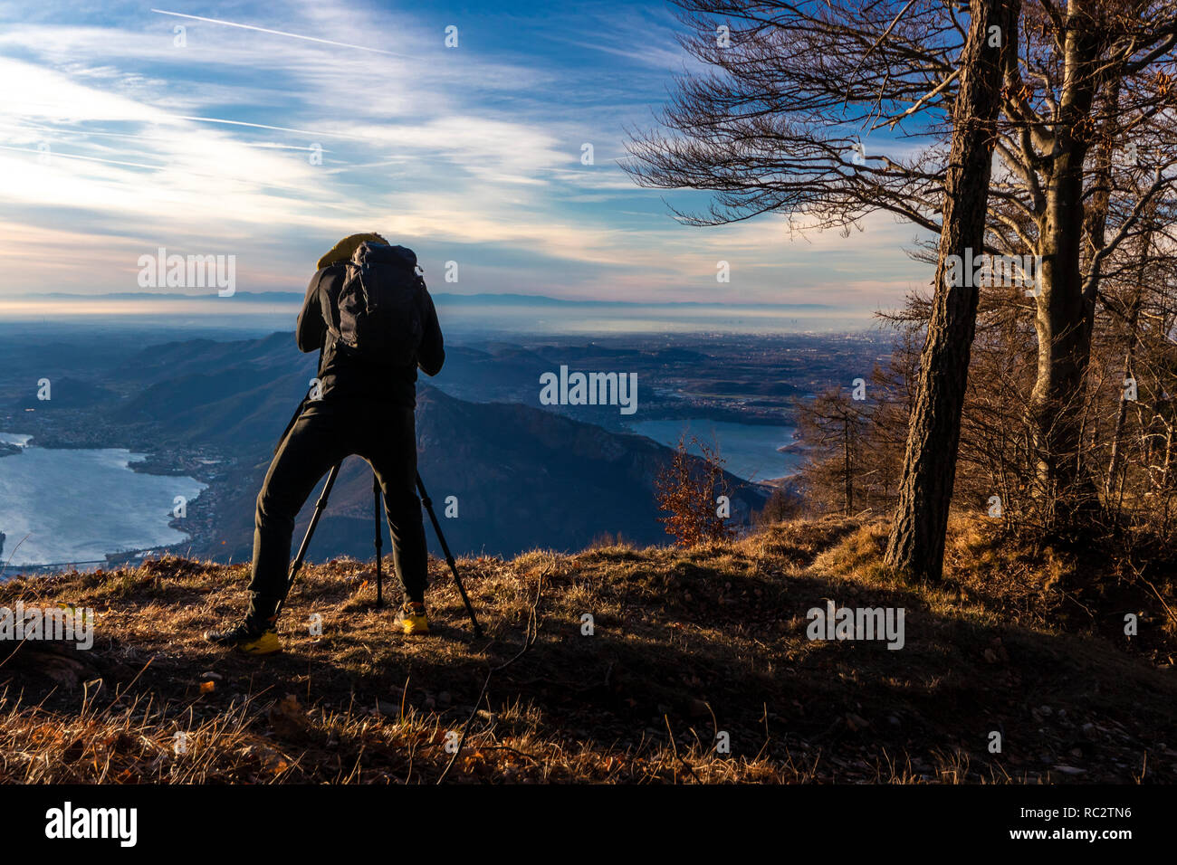 landscape photographer in action - mountain hiking Stock Photo - Alamy