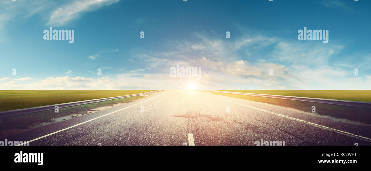 Panoramic road sunrise summer travel Stock Photo - Alamy