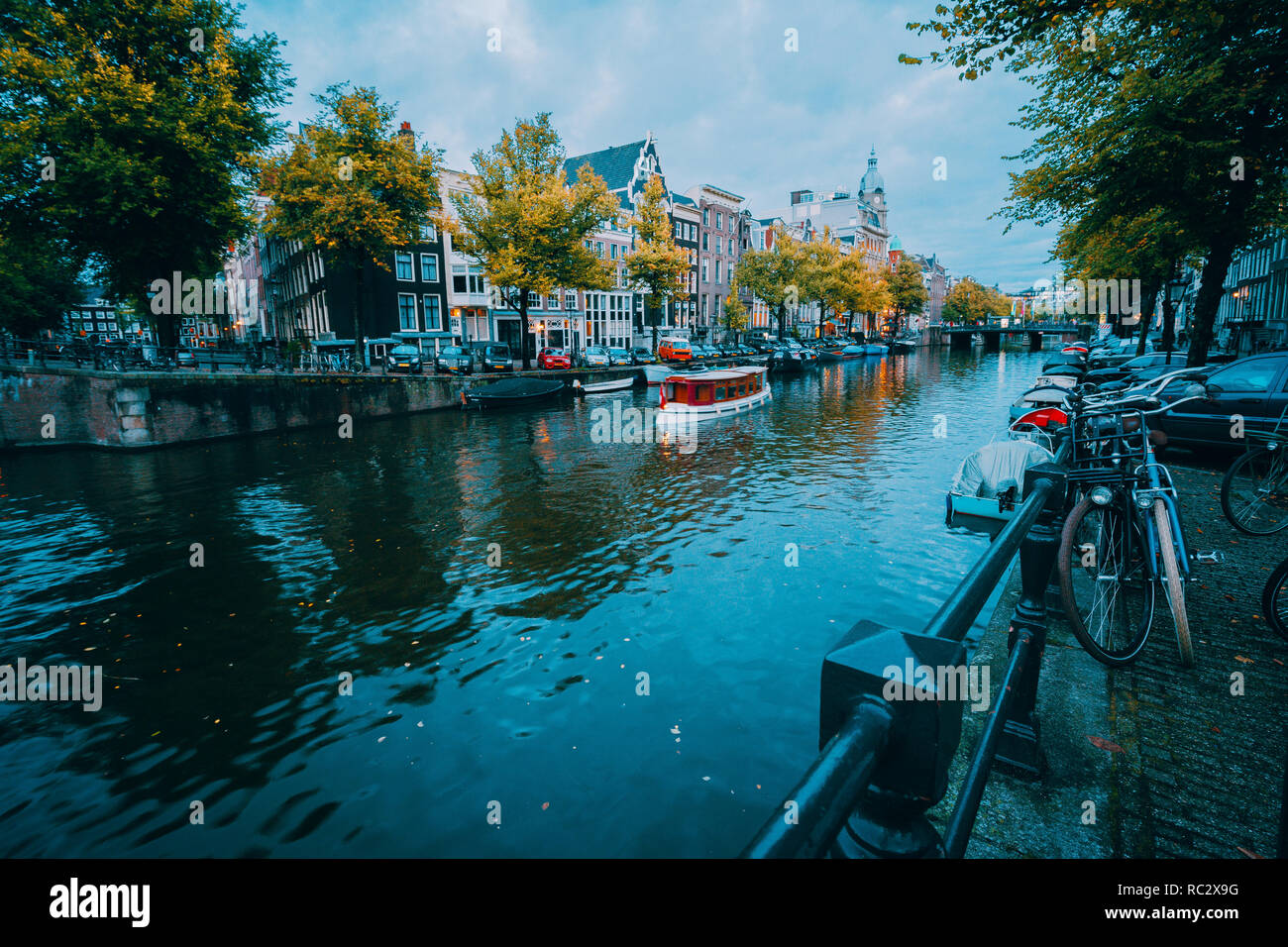 Amsterdam cityscape before the blue hour, Holland, The Netherlands ...