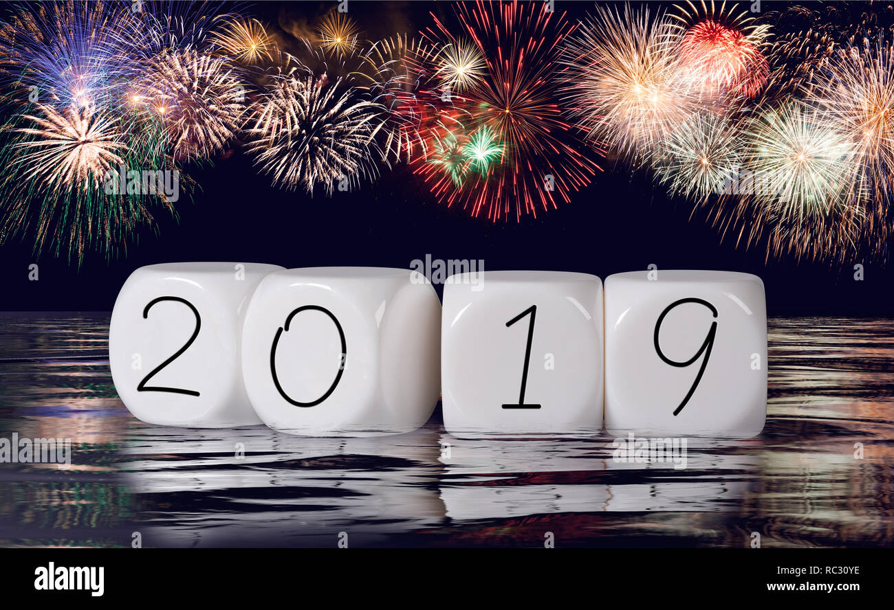 Composite of fireworks and calendar for 2019 New Year holiday ...