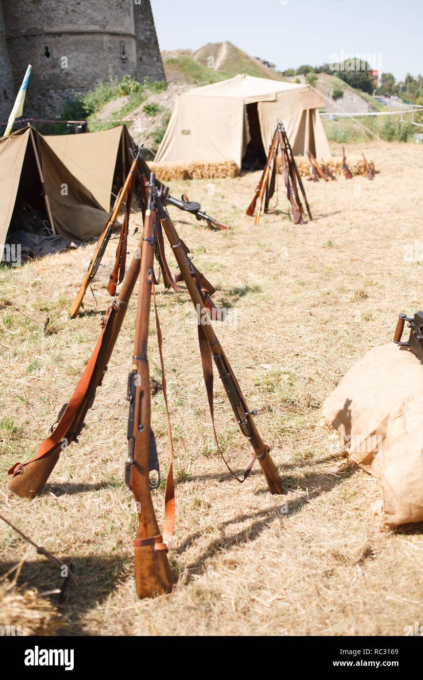 Rifles pyramids with ammunition, First World War-era reenactment Stock ...