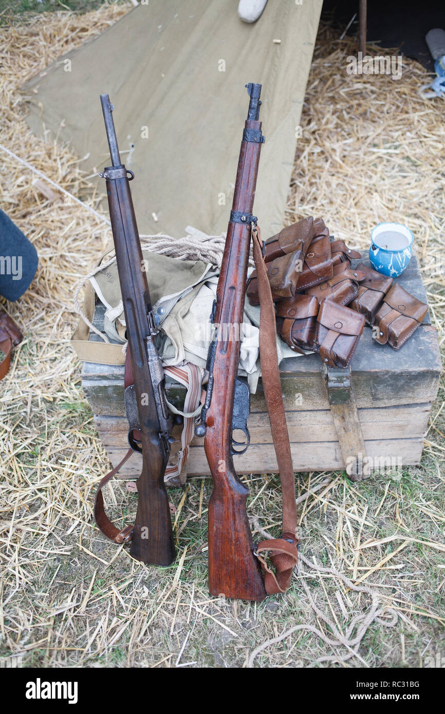 Rifles pyramids with ammunition and german steel helmet, First World ...