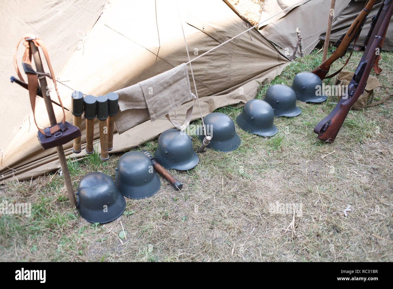 Rifles pyramids with ammunition and german steel helmet, First World ...