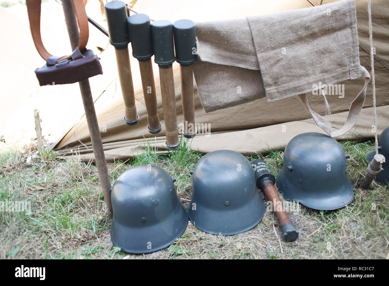 Rifles pyramids with ammunition and german steel helmet, First World ...