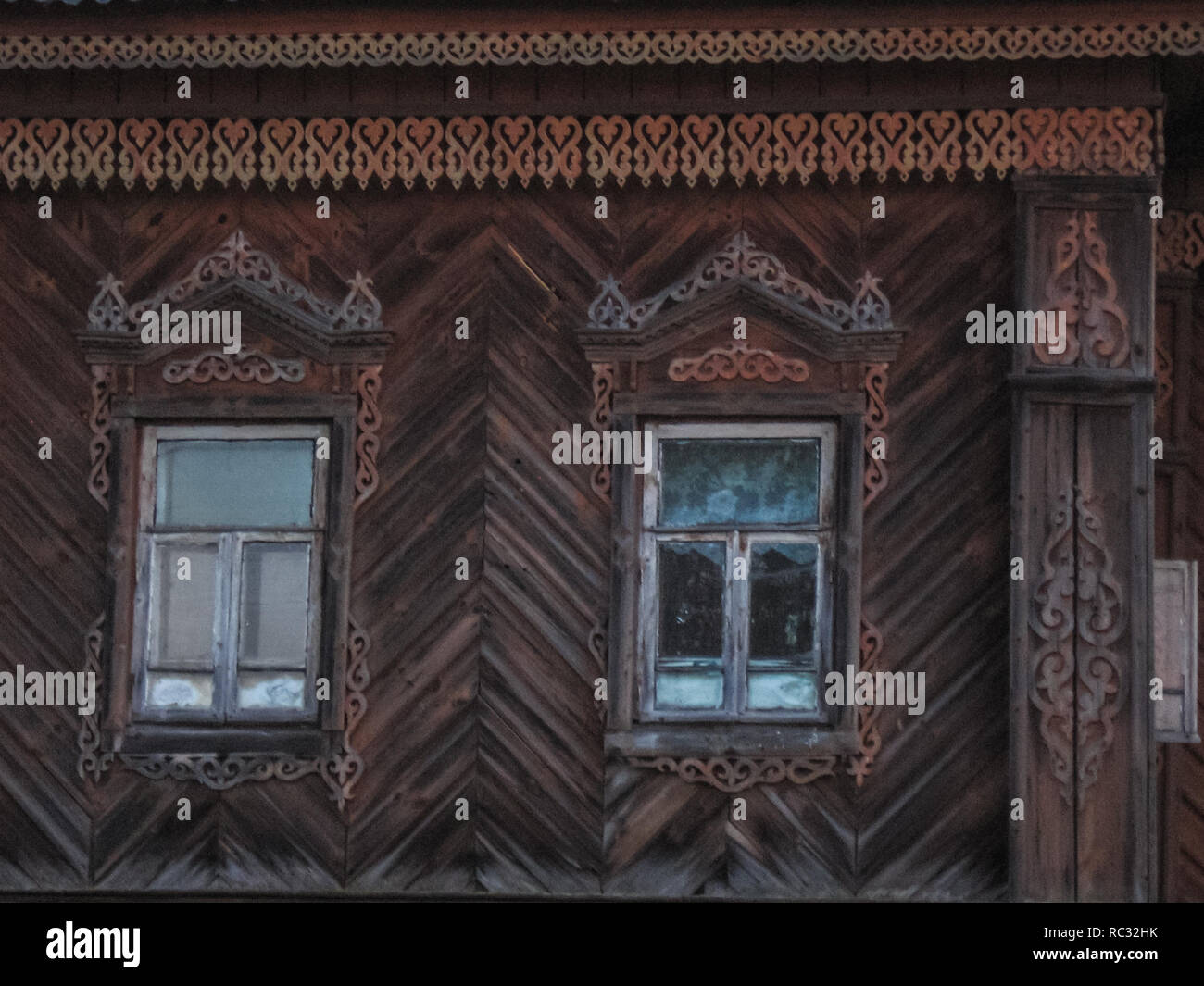Plinths of windows of wooden houses. Ancient style of decoration of ...