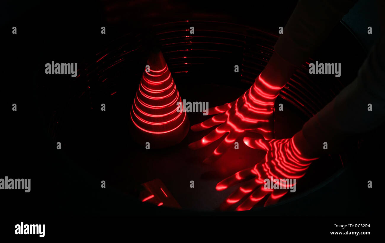 Interactive exposition in science museum - optical illusion with red ...