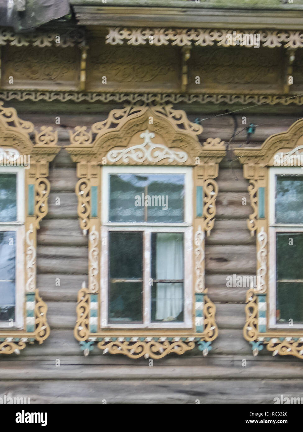 Plinths of windows of wooden houses. Ancient style of decoration of ...