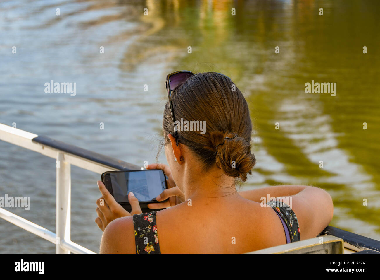 PRAGUE, CZECH REPUBLIC - AUGUST 2018: Person checking pictures on a ...