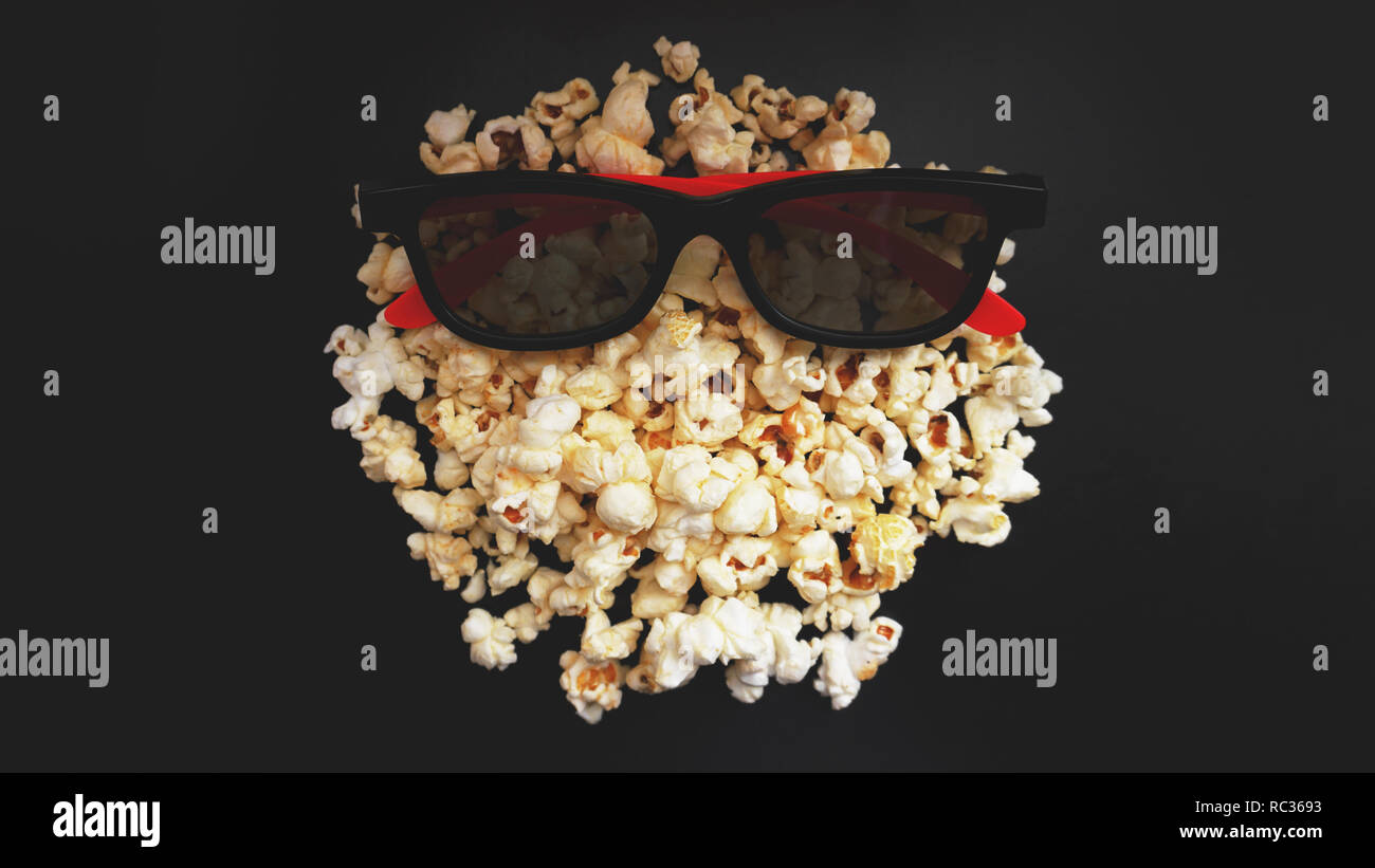 Abstract image of viewer, 3D glasses and popcorn on black background ...
