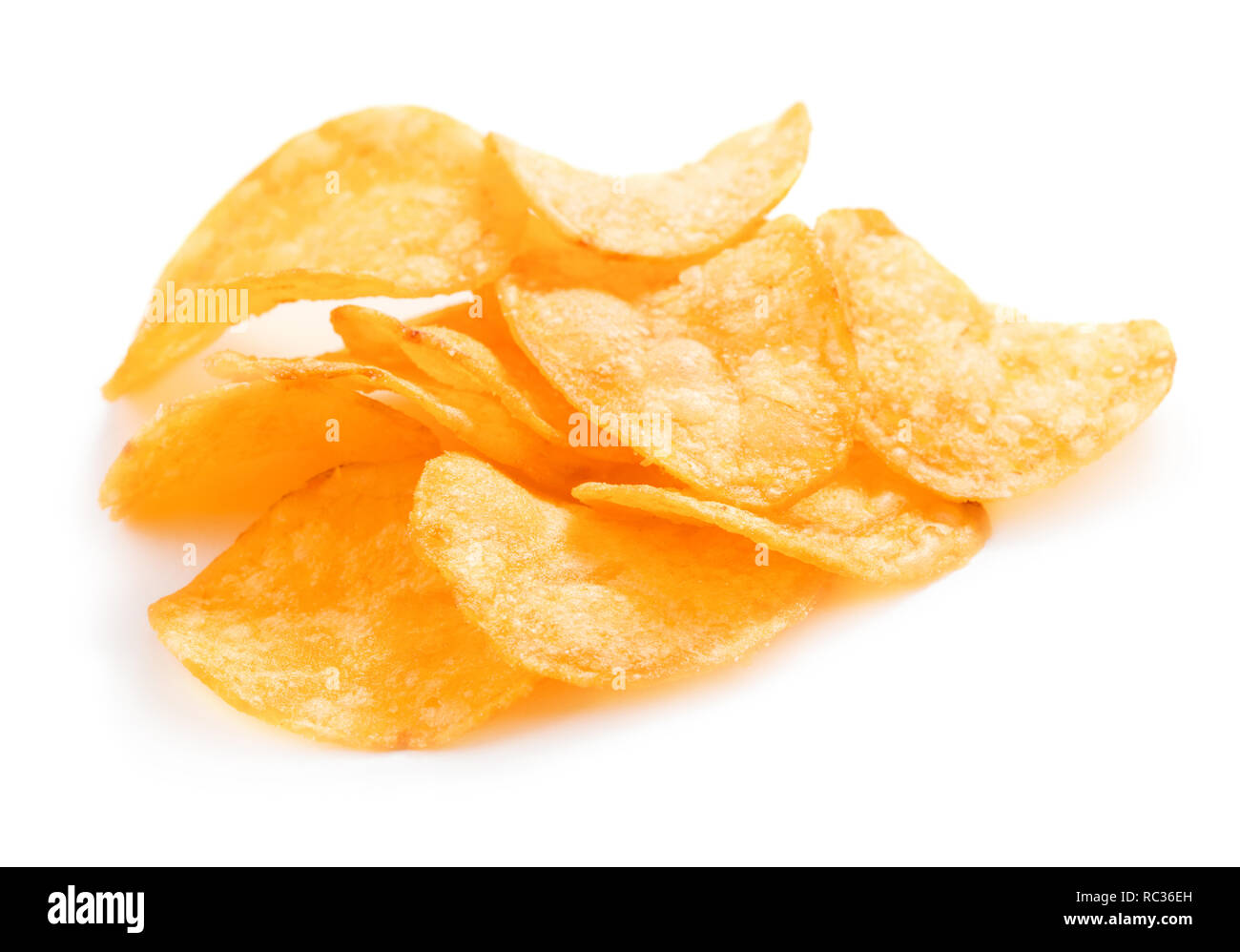 heap of potato chips isolated on white background Stock Photo - Alamy