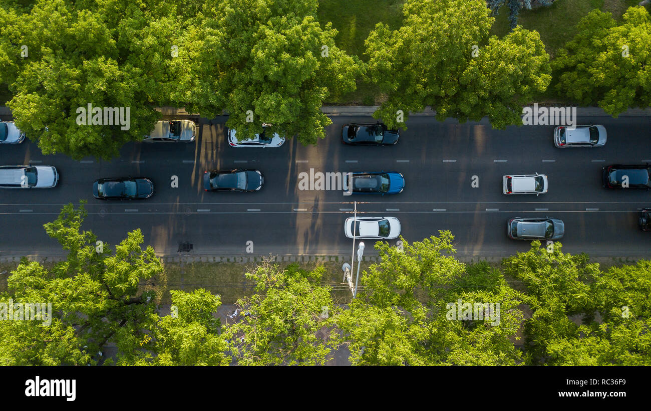 Aerial Drone Flight top down View of freeway busy city rush hour heavy ...