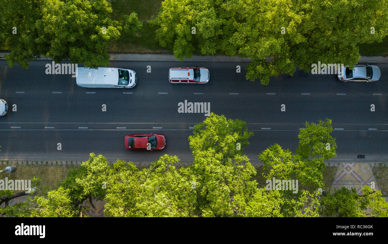 Aerial Drone Flight top down View of freeway busy city rush hour heavy ...