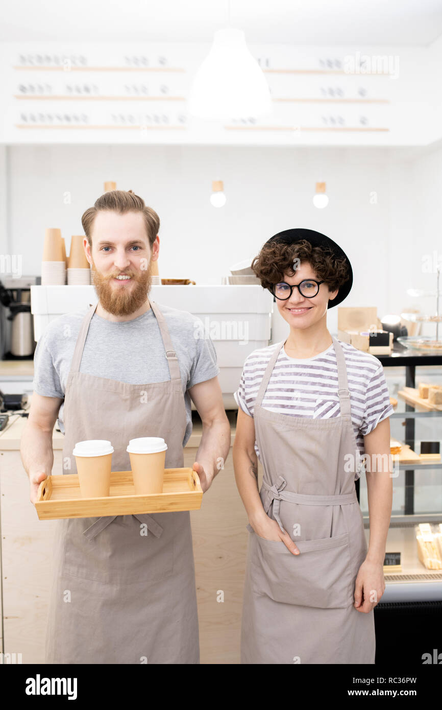 Baristas working in modern coffee shop Stock Photo - Alamy