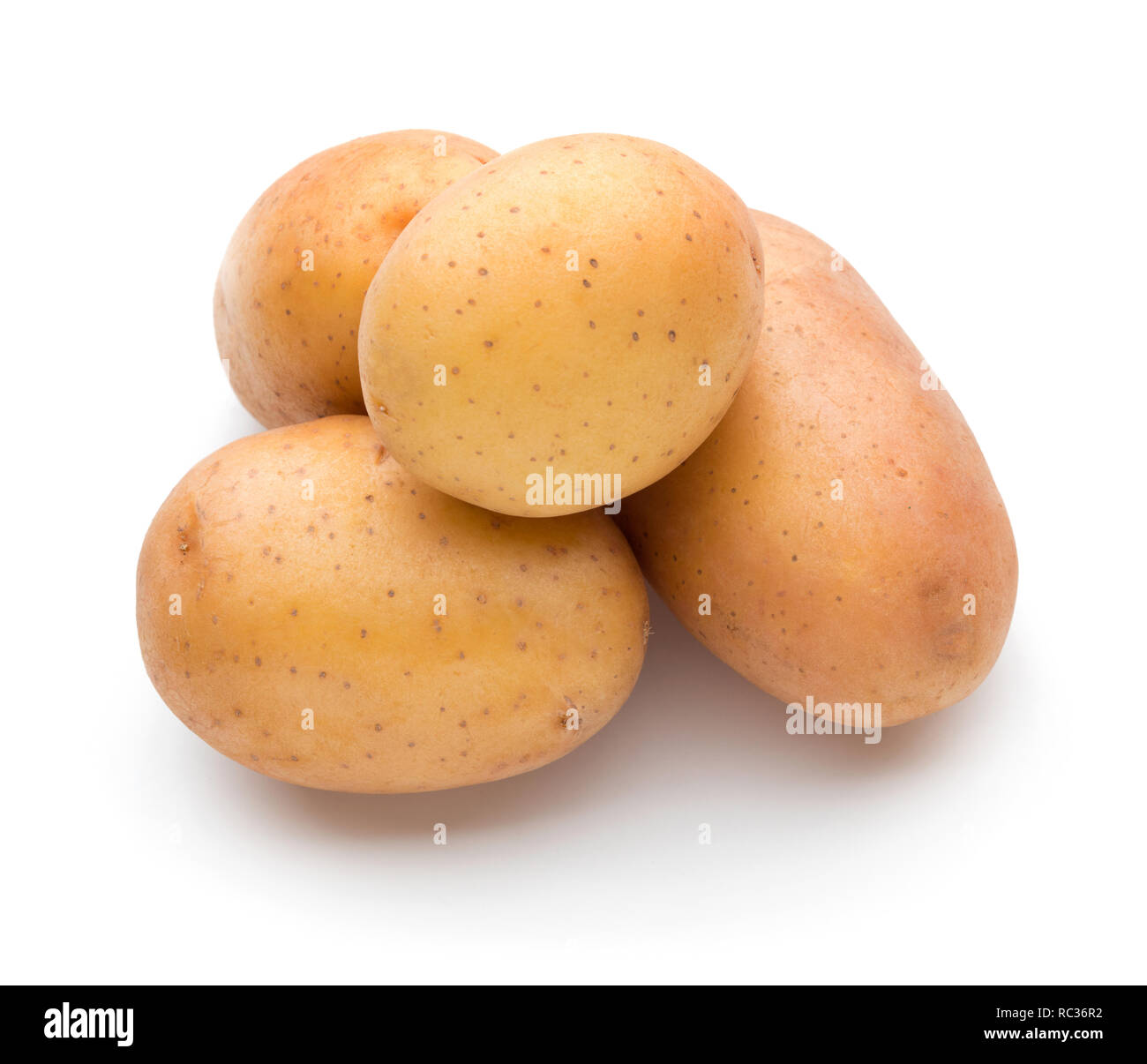 heap of ripe potato isolated on white background Stock Photo - Alamy
