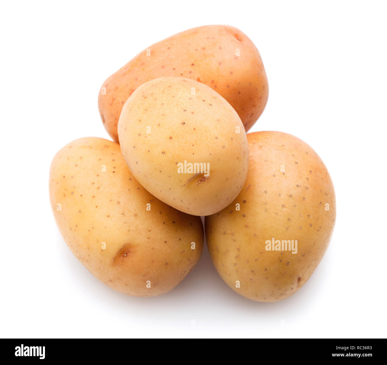 heap of ripe potato isolated on white background Stock Photo - Alamy